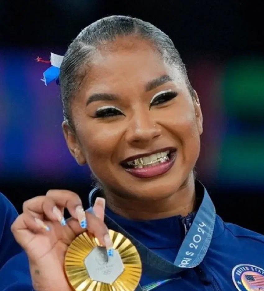 Jordan Chiles' Teeth: Gold and Diamond Veneers | LEMA